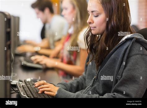 Woman Typing In Computer Room In College Stock Photo Alamy