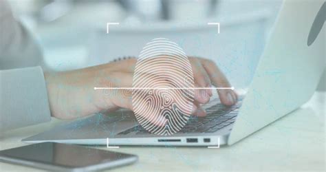 Image Of Fingerprint And Network Of Connections Over Hands Using Laptop