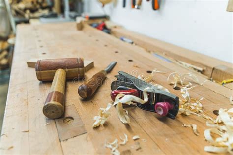 Carpenter Tools A Wooden Mallet A Chisel And A Planer With Wooden