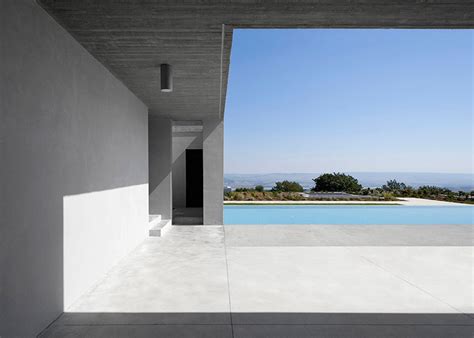 Concrete Home By Osm Is Sunken Into A Hill By An Italian Lake