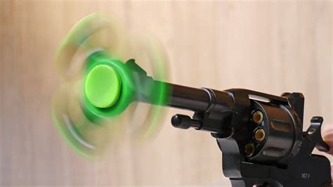Experiment Gun Vs Fidget Spinner Youtube