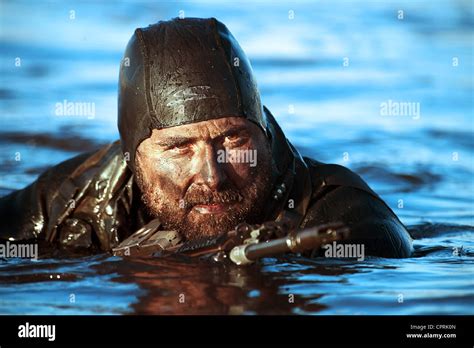 Us Navy Seals During Water Training At Sunrise October 21 2009 In