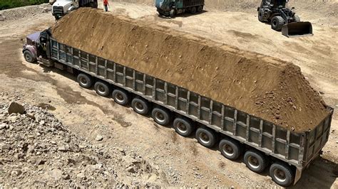 Caterpillar 336d Excavator Loading Trucks Pozzolan Mining S4•e5