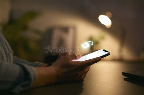 Close Up Of Woman Using Mobile Phone With Security Padlock Overlay At