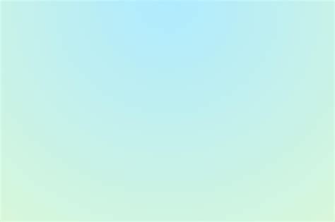 연한 녹색 배경의 파스텔 블루 하늘 프리미엄 사진