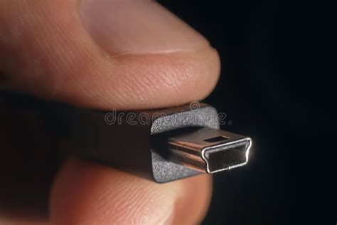 Hand Holding Black Micro USB Cable Man S Hand Holds A USB Micro Connector Stock Image Image