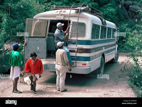 A Bus Driver And His Assistant Load In Their Bus A Goat The Just Bought