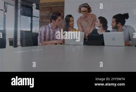 Data Analysis Animation Over Diverse Team Collaborating With Laptops In Office Teamwork