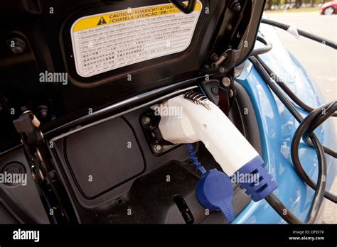 Nissan Leaf Electric Car Charger Plug Stock Photo Alamy