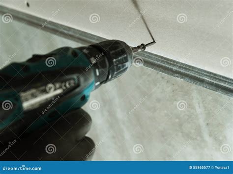 Man Fixes The Drywall Stock Image Image Of Working Metal 55865577