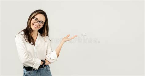 Friendly Young Woman With Long Brunette Hair And Glasses Smiling And