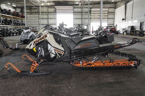 New 2024 Polaris® 850 Rmk Khaos Slash 165 Gloss Black Military Tan Orange Burst Snowmobile In