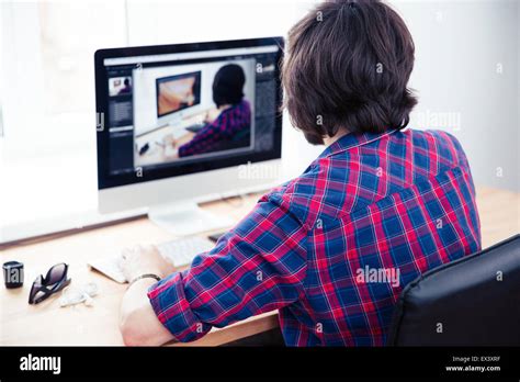 View Back Of Man Computer Screen Stock Photos View Back Of Man Computer Screen Stock Images