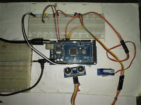 Controlling Servo Motor Using Arduino And Ultrasonic Sensor
