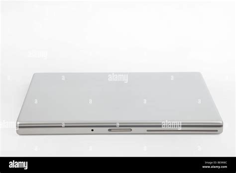 Cutout Of A Closed Laptop Computer On White Background Stock Photo Alamy