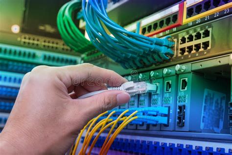 Man Connecting Fiber Network Cables Stock Photo Image Of Center Electronic