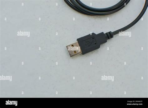 Black USB Type C Cable Detail Highlighted On A Clear Surface Perfect For Modern Technology