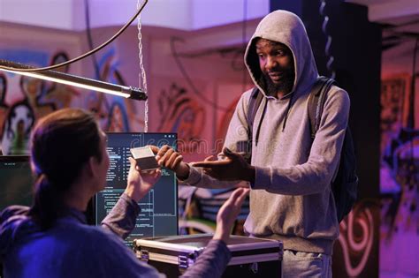 Hacker Bringing Ssd With Illegal Spyware Stock Image Image Of Hood