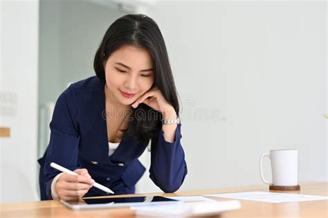 Gorgeous Asian Businesswoman Or Female Secretary Working At Her Office