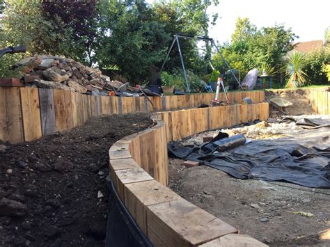 Oak Sleeper Retaining Wall All About Those Curves Landscaping