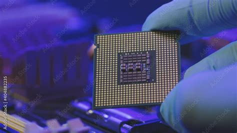 concept of computer motherboard hardware and technology laboratory technician holds a