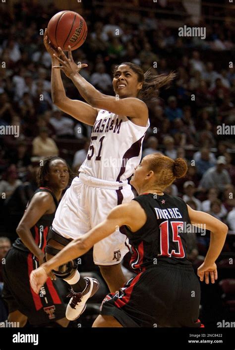 Texas Aandm Guard Sydney Colson 51 Shoots The Ball Against Texas Tech Defender Casey Morris 15