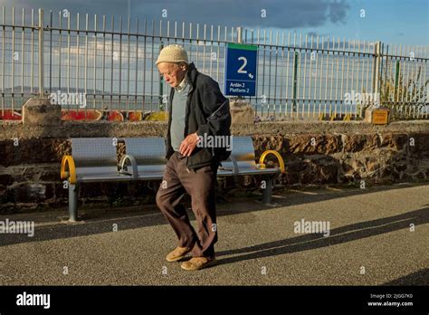 Old Man At Irish DART Stop Dublin Stock Photo Alamy