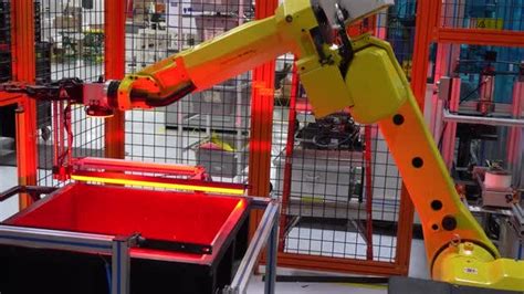 Automated Robotic Assembly In A Factory Setting Industrial Stock