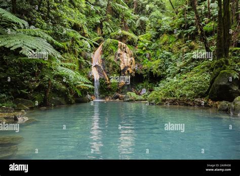 Blue Lagoon Of Natural Hot Spring At Caldeira Velha Where People Swim