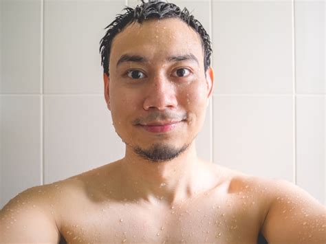 Premium Photo Smaile And Happy Asian Man Take A Selfie Shot In The