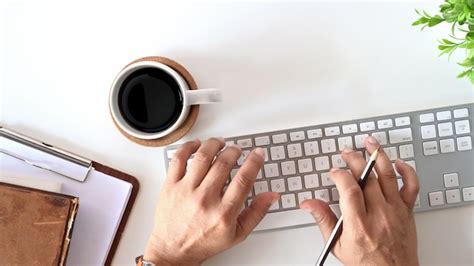 Premium Photo Man Hand Typing Keyboard In Office White Wooden Workspace And Copy Space