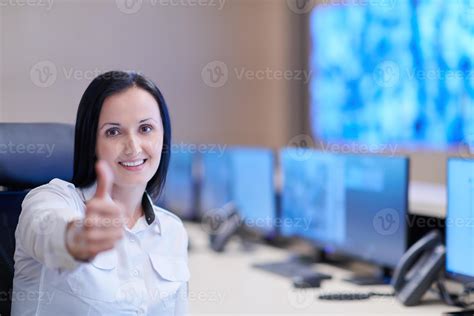 Portrait Of Female Operator In A Security Data System Control Room Stock Photo At Vecteezy