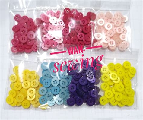 กระดุมติดเสื้อเชิ้ตสีขาว สีดำ และสีต่างๆ ขนาด11มิล แพ็ค 50เม็ด มี 41 สี Th