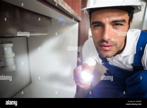 Portrait Of Man Holding Illuminated Torch Stock Photo Alamy