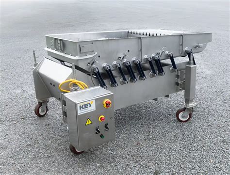Vibratory Conveyor With Alignment Tray Omar Associates
