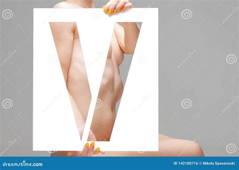 Nude Girl Holding Stencil Letter V Stock Photo Image Of Sneak Female
