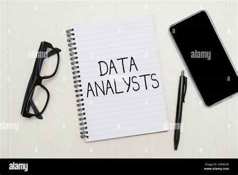 Text Sign Showing Data Analysts Concept Meaning Programmer Design And Create Report Identifies