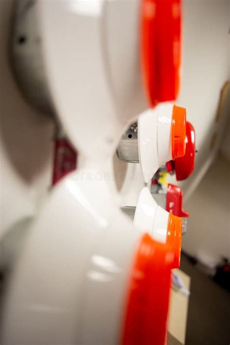 Fire Alarm And Mock Sprinkler System Attached To A White Wall Used For