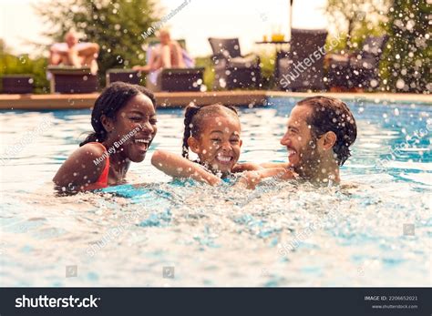 Family Having Fun In Swimming Pool Images Stock Photos Vectors Shutterstock