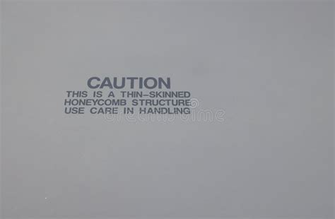 Caution Warning Sign On Fuselage And Wings Of Modern Jet Fighter Stock
