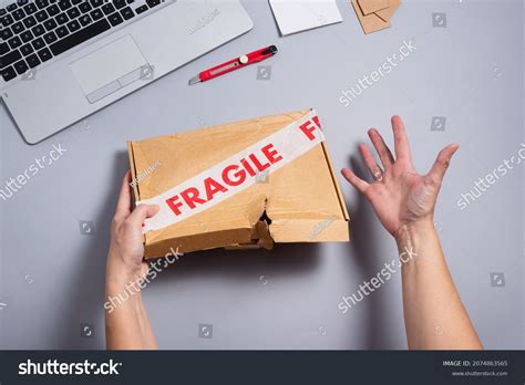 Broken Fragile Parcel Torn Cardboard Box Stock Photo 2074863565 Shutterstock