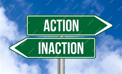 Premium Photo Action Vs Inaction Road Sign On Blue Sky Background