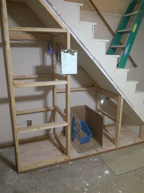 Under Basement Stairs Storage Ideas Openbasement