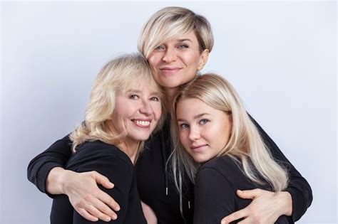 Premium Photo Three Generations Of Women Hug And Smile Beautiful