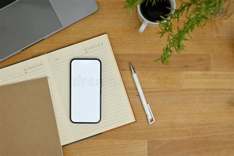Top View Minimal Wood Tabletop Workspace With Smartphone Mockup Pen