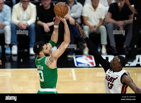 Boston Celtics Forward Jayson Tatum 0 Takes A Shot Against Miami Heat