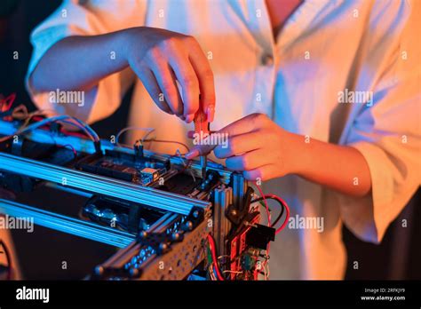 Teen Doing Experiments In Robotics In A Laboratory Close View Of A