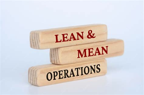 Premium Photo Lean And Mean Operations Text On Wooden Blocks Business