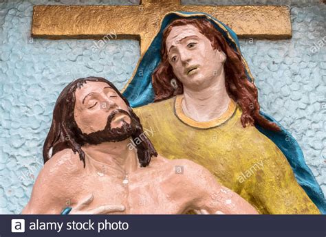 Religious Stone Statue In Color Representing The Pity Of Michelangelo Mary Mother Holding Jesus