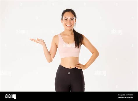 Sport Wellbeing And Active Lifestyle Concept Portrait Of Cheerful Attractive Asian Fitness